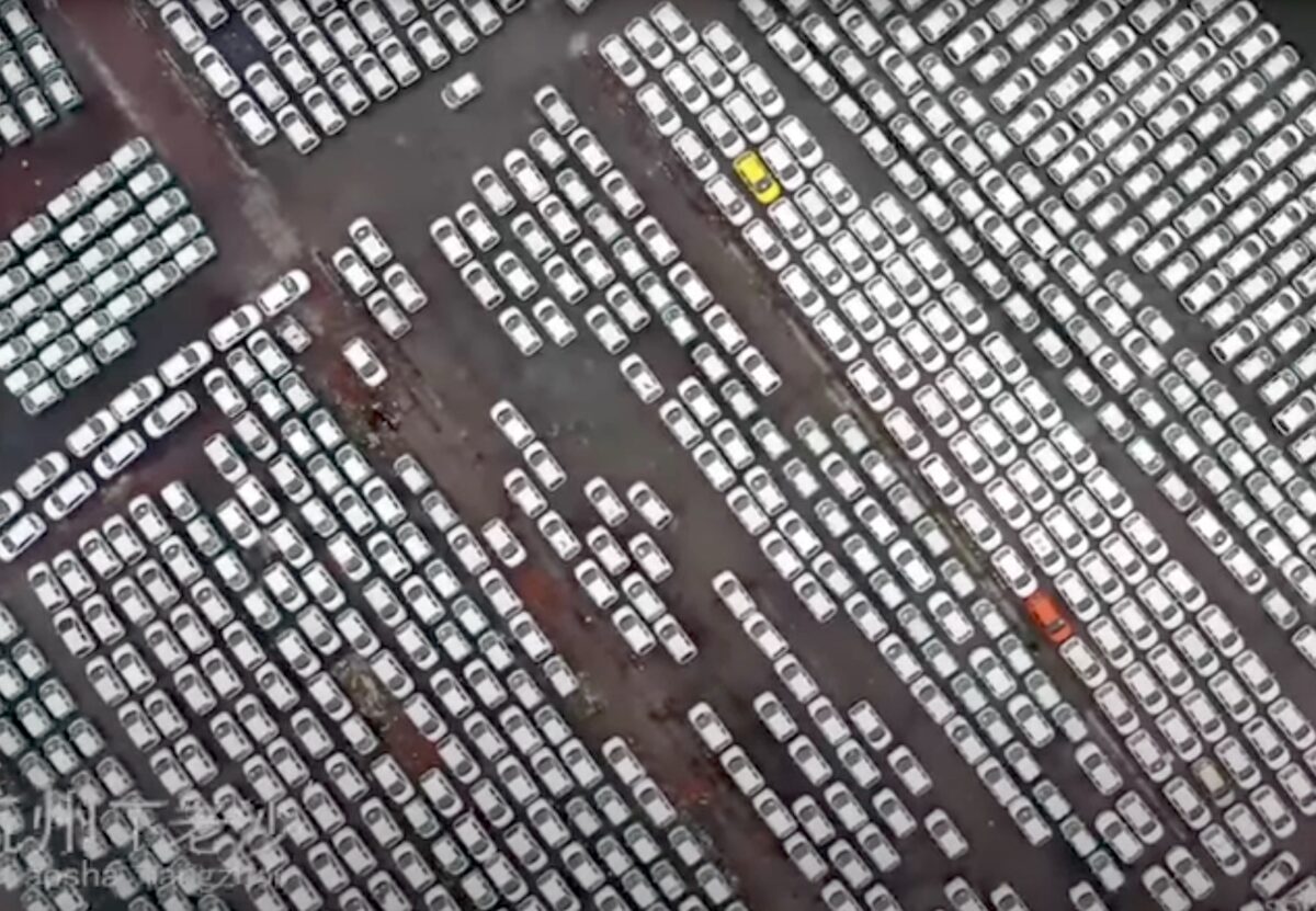 China's Abandoned EV Graveyard: Thousands Of Cars Rot In Huge Fields ...